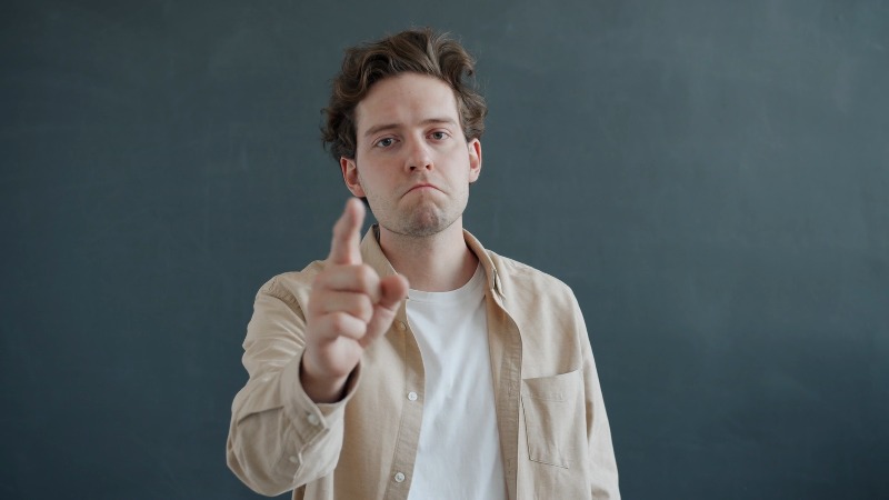 Man, Looking At Camera, Grey Background, Finger Wagging by VITALY ...