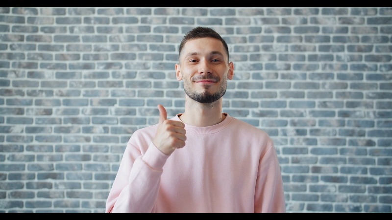 Smiling, Looking At Camera, Thumbs Up, Brick Wall by VITALY GARIEV ...